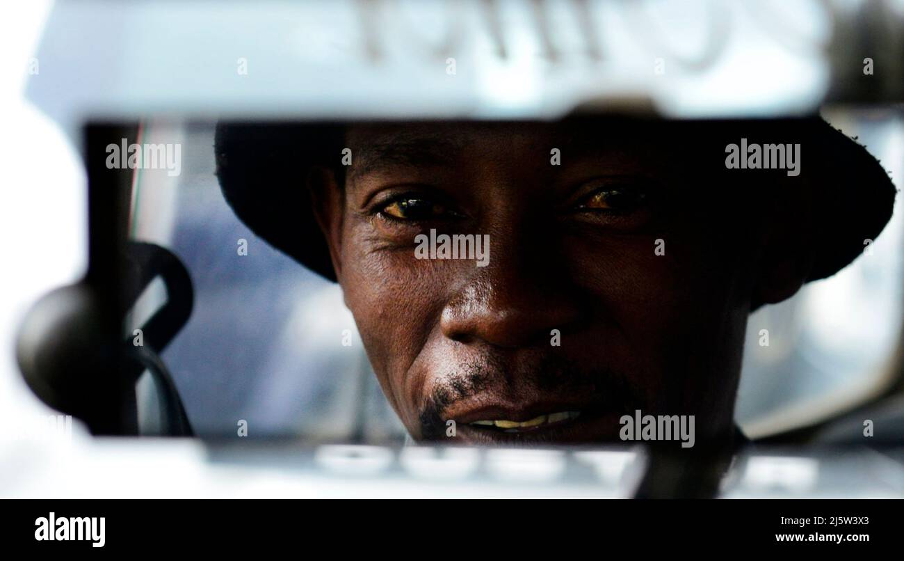 A smiling Malagasy taxi driver in Antananarivo, Madagascar Stock Photo ...