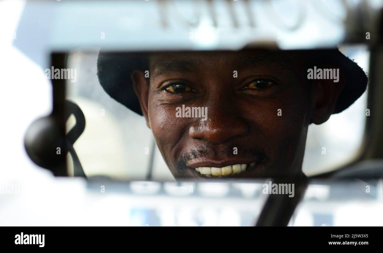 A smiling Malagasy taxi driver in Antananarivo, Madagascar Stock Photo ...
