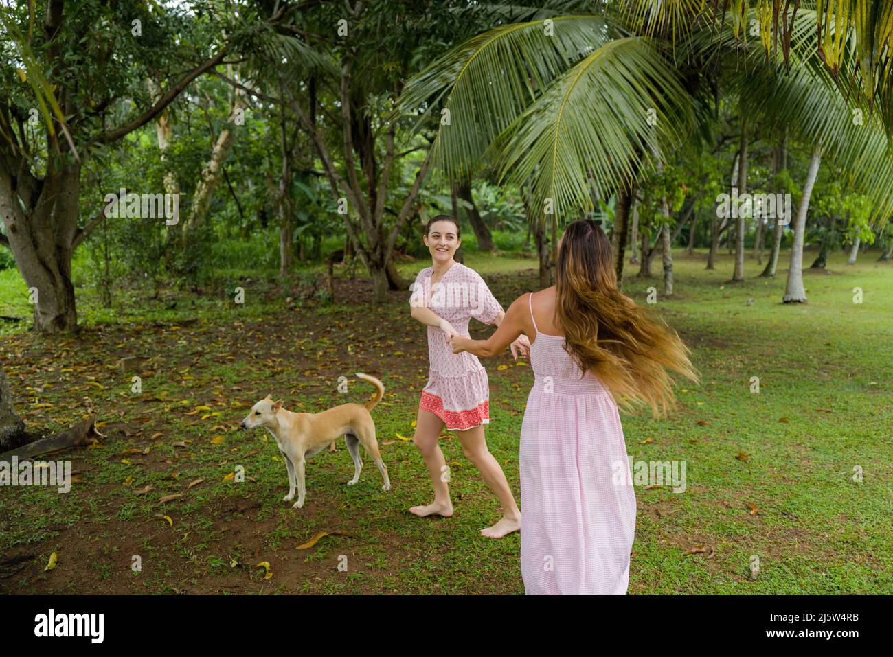 Woman spinning friends nature hi-res stock photography and images - Alamy