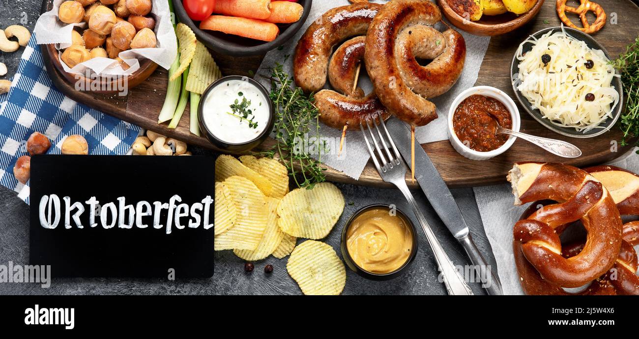 Beer and snack set. Oktoberfest food frame concept. Variety of grilled ...