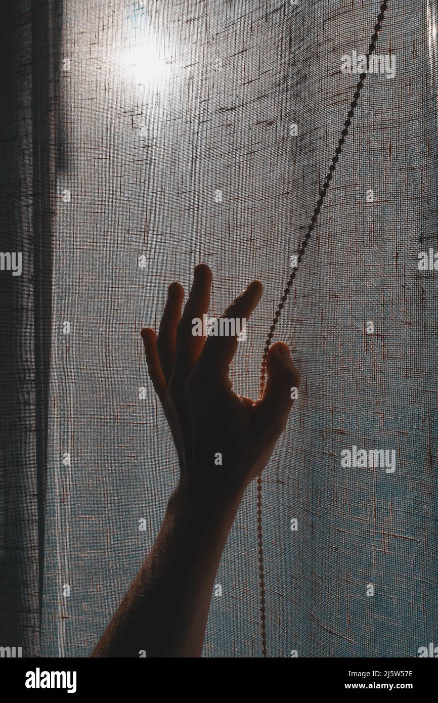 hand gesturing in the shadows Stock Photo - Alamy