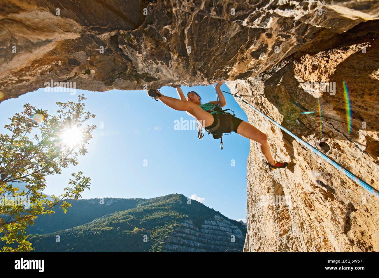 woman climbing out of a cave at the French Riviera Stock Photo - Alamy