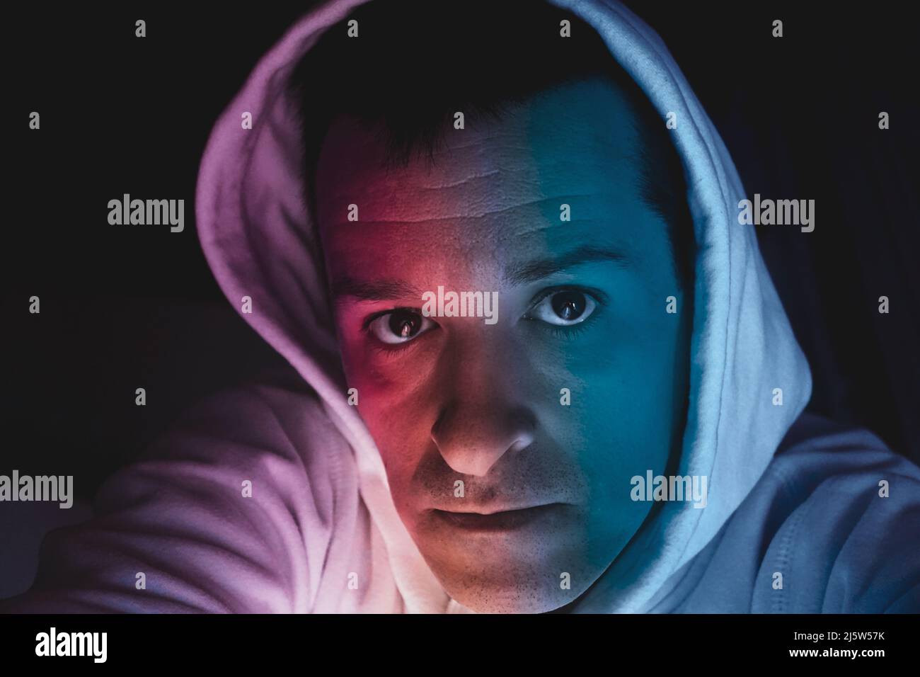 man taking a selfie in the shadows Stock Photo - Alamy