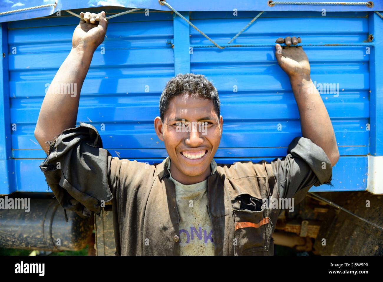 Portrait of a smiling Malagasy man taken in the Ambohimanga region in ...
