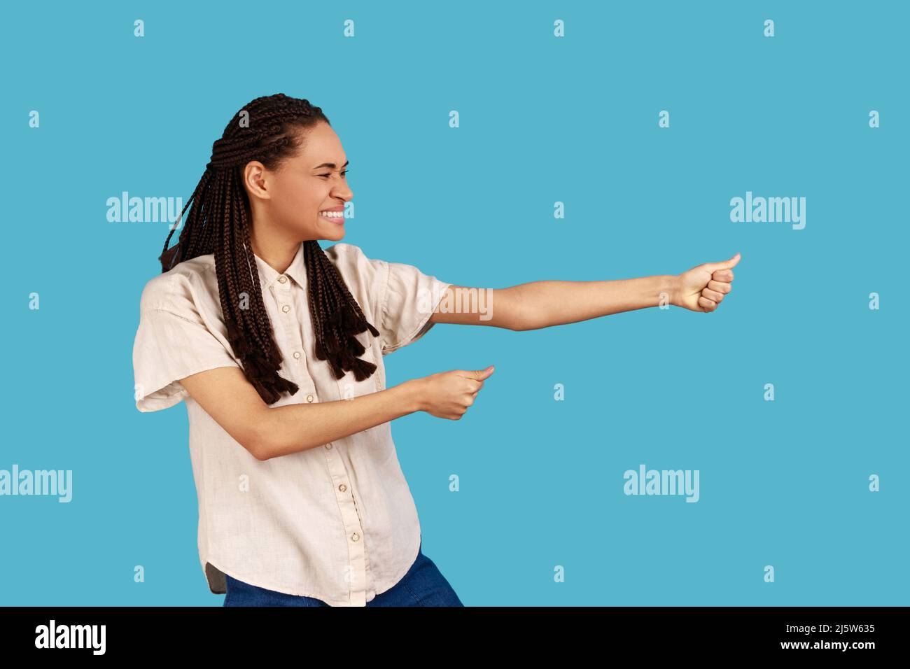 Profile portrait strong assertive woman with dreadlocks pulling ...
