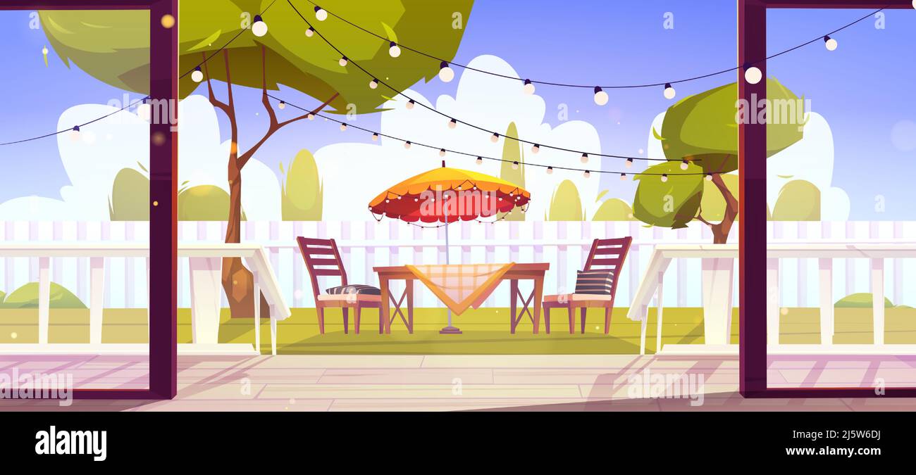 House wooden terrace and view to backyard with green trees, fence ...