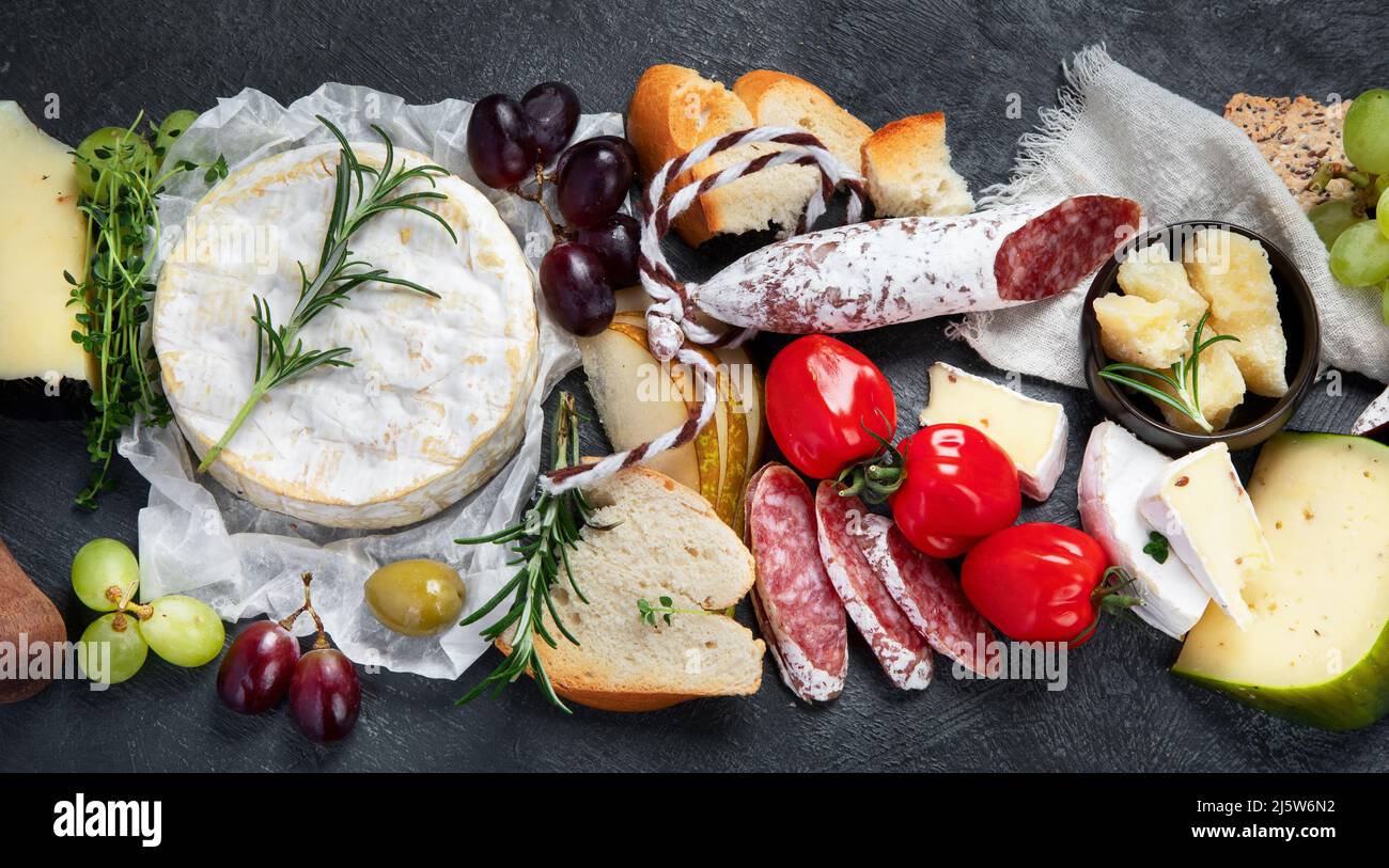 Appetizers assortment on dark background. Mediterranean food concept ...