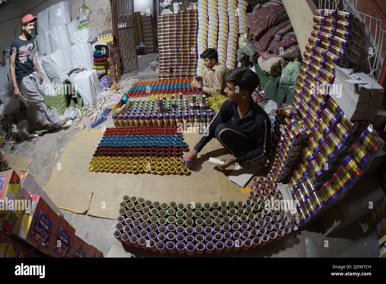 Pakistani Kashif Bangles Factory's worker are busy preparing metal ...