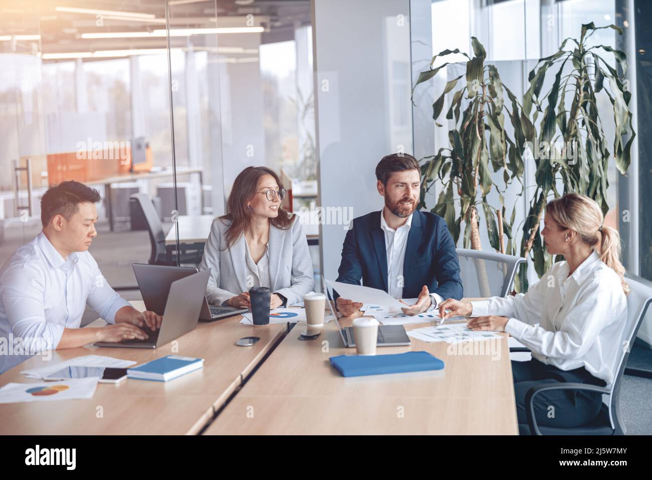 Corporate business team and manager in a meeting room at modern office ...