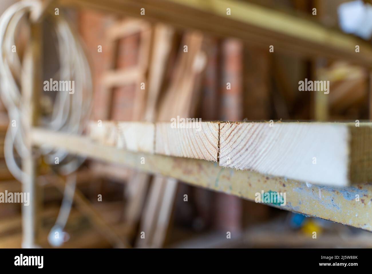 Smooth cut of a board close-up at a construction site Stock Photo - Alamy