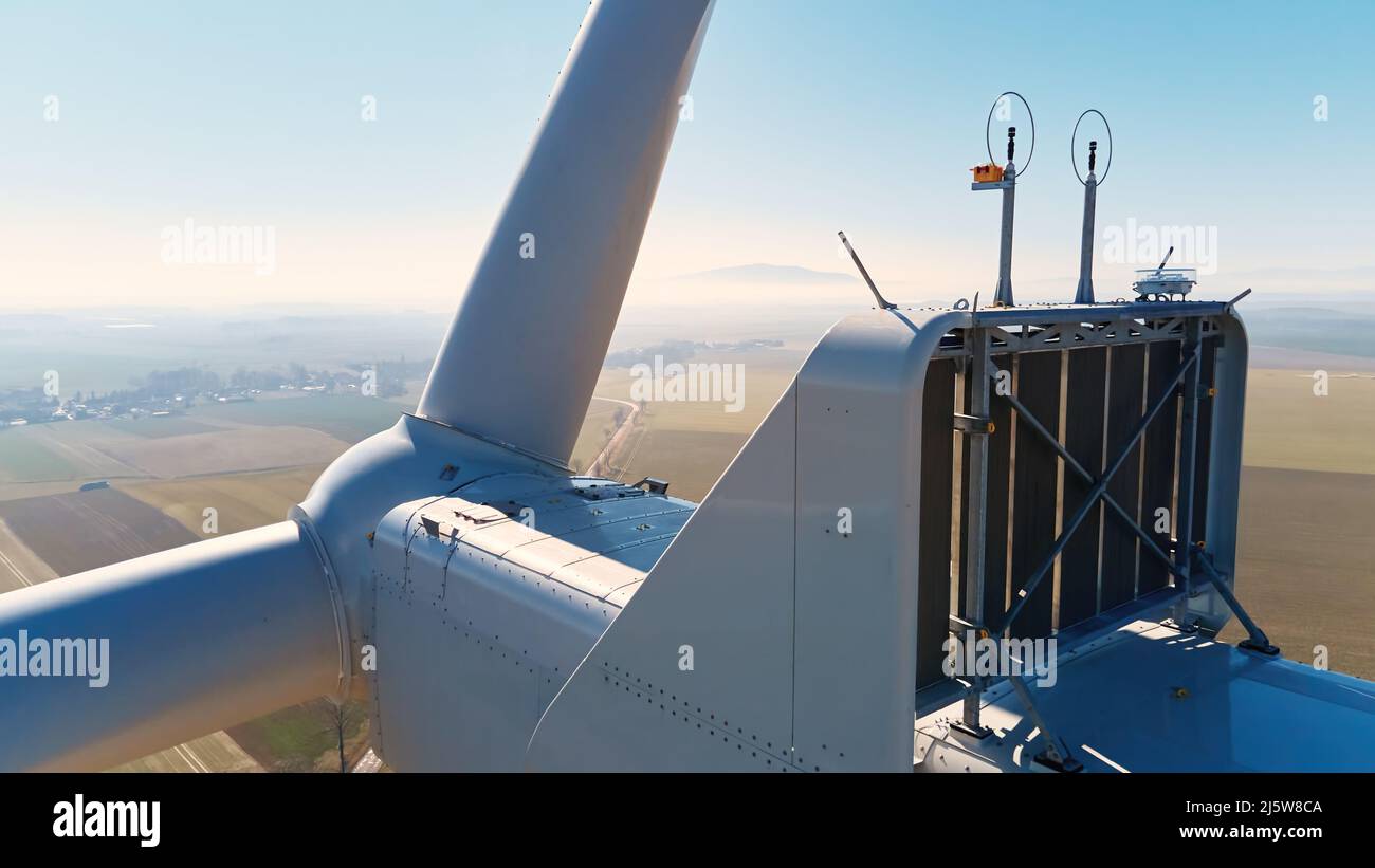 Aerial view of part of windmill turbine in countryside, Green energy ...