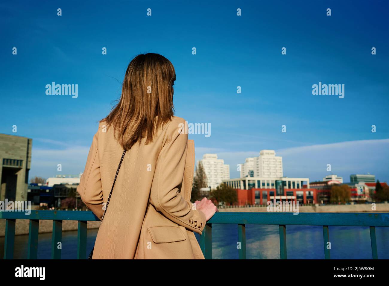 Woman walk street back hi-res stock photography and images - Alamy