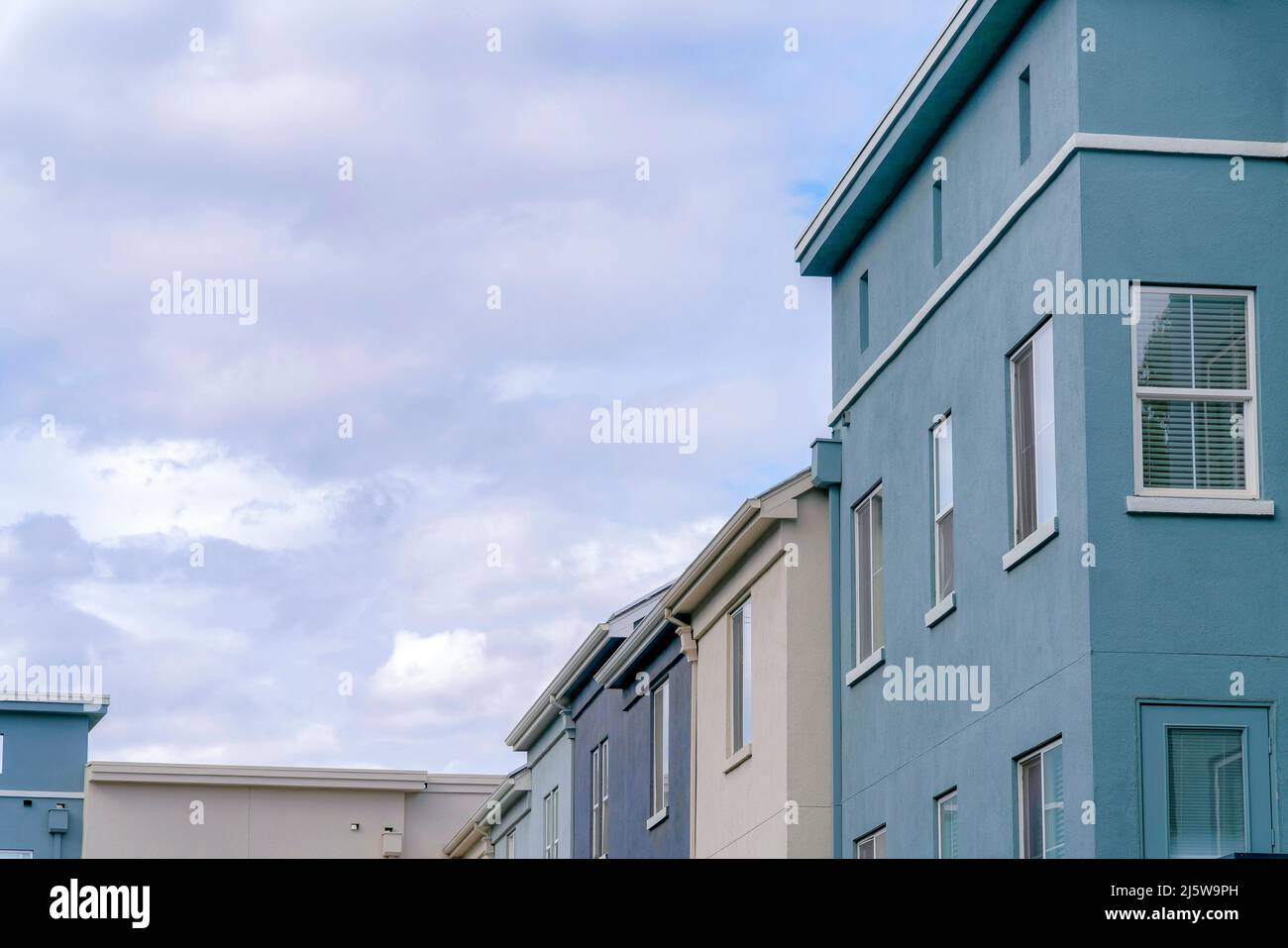 Complex residential building with gray and beige color tones at Silicon ...