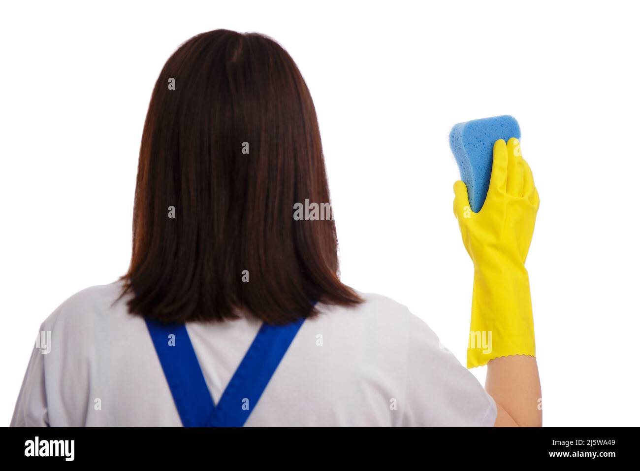 back view of female cleaner cleaning something with sponge isolated on ...