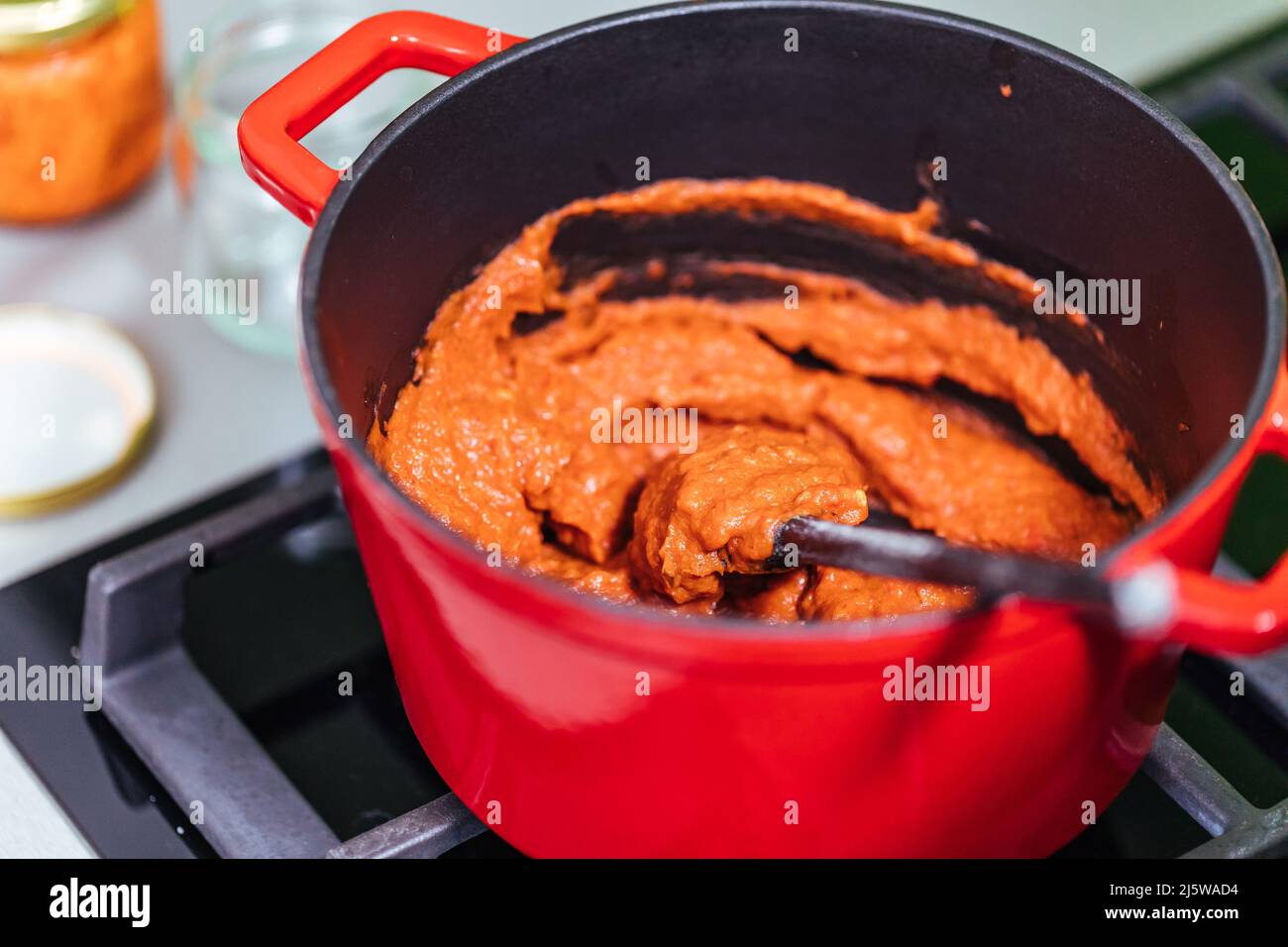 Spread called ajvar made from red peppers and eggplant, recipe making ...