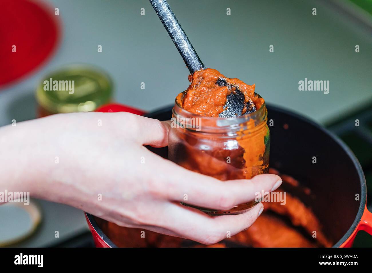 Spread called ajvar made from red peppers and eggplant, recipe making ...