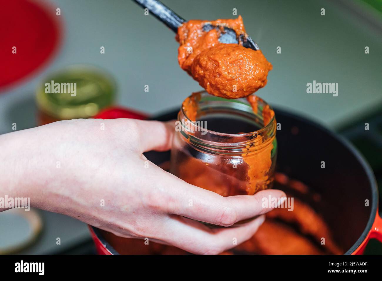 Spread called ajvar made from red peppers and eggplant, recipe making ...