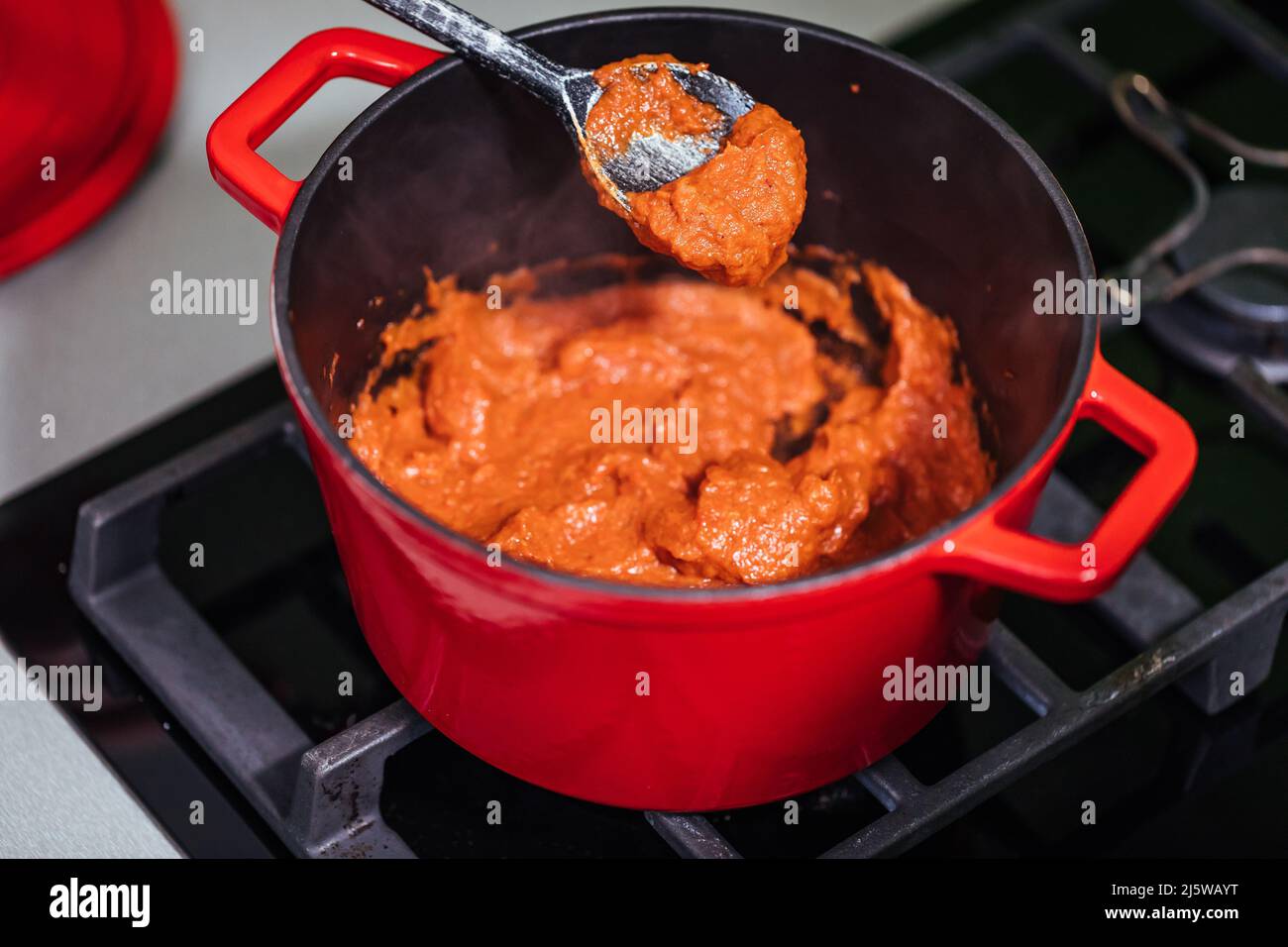 Spread called ajvar made from red peppers and eggplant, recipe making ...