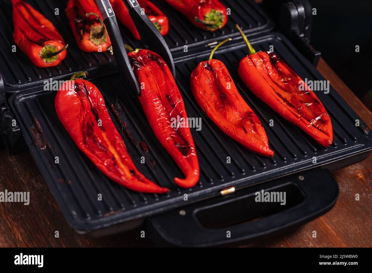 Spread called ajvar made from red peppers and eggplant, recipe making ...