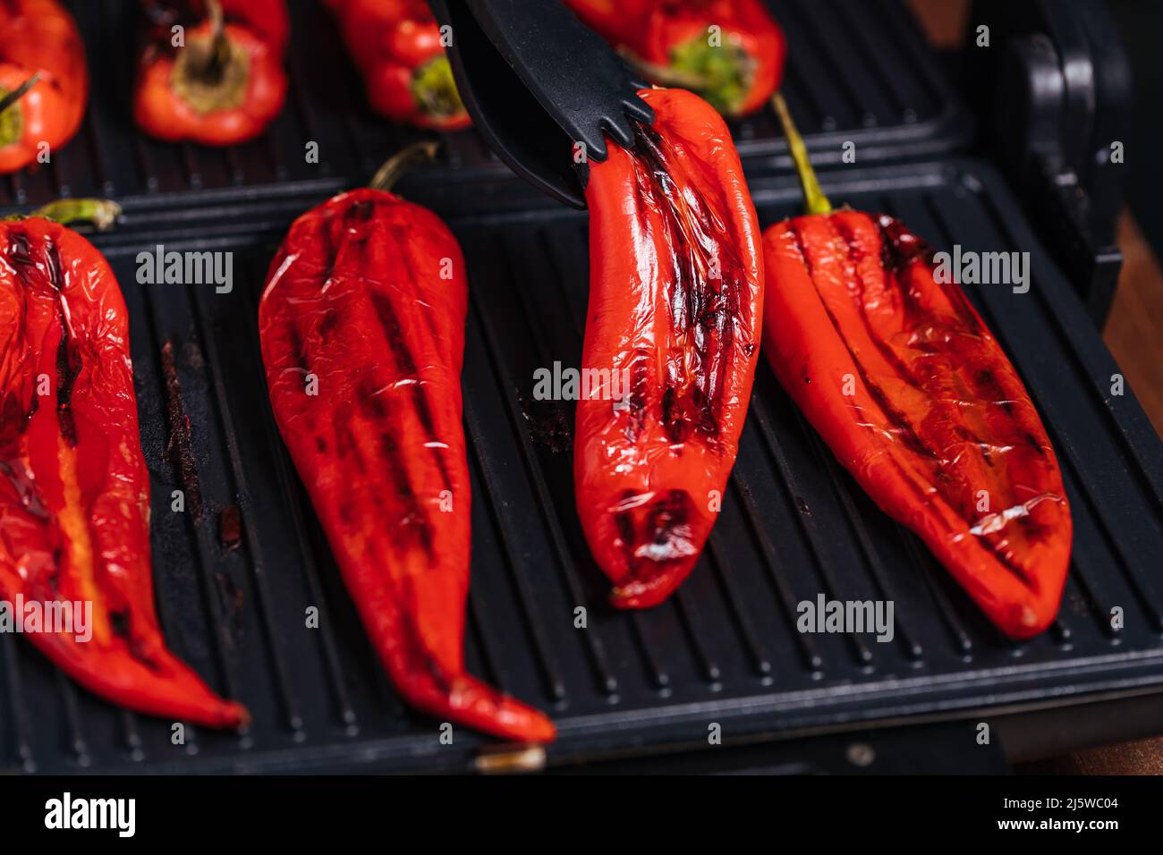 Spread called ajvar made from red peppers and eggplant, recipe making ...