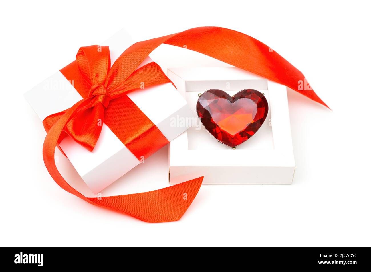 Huge heart shaped fake gem ring in a white gift box with a red bow and ...