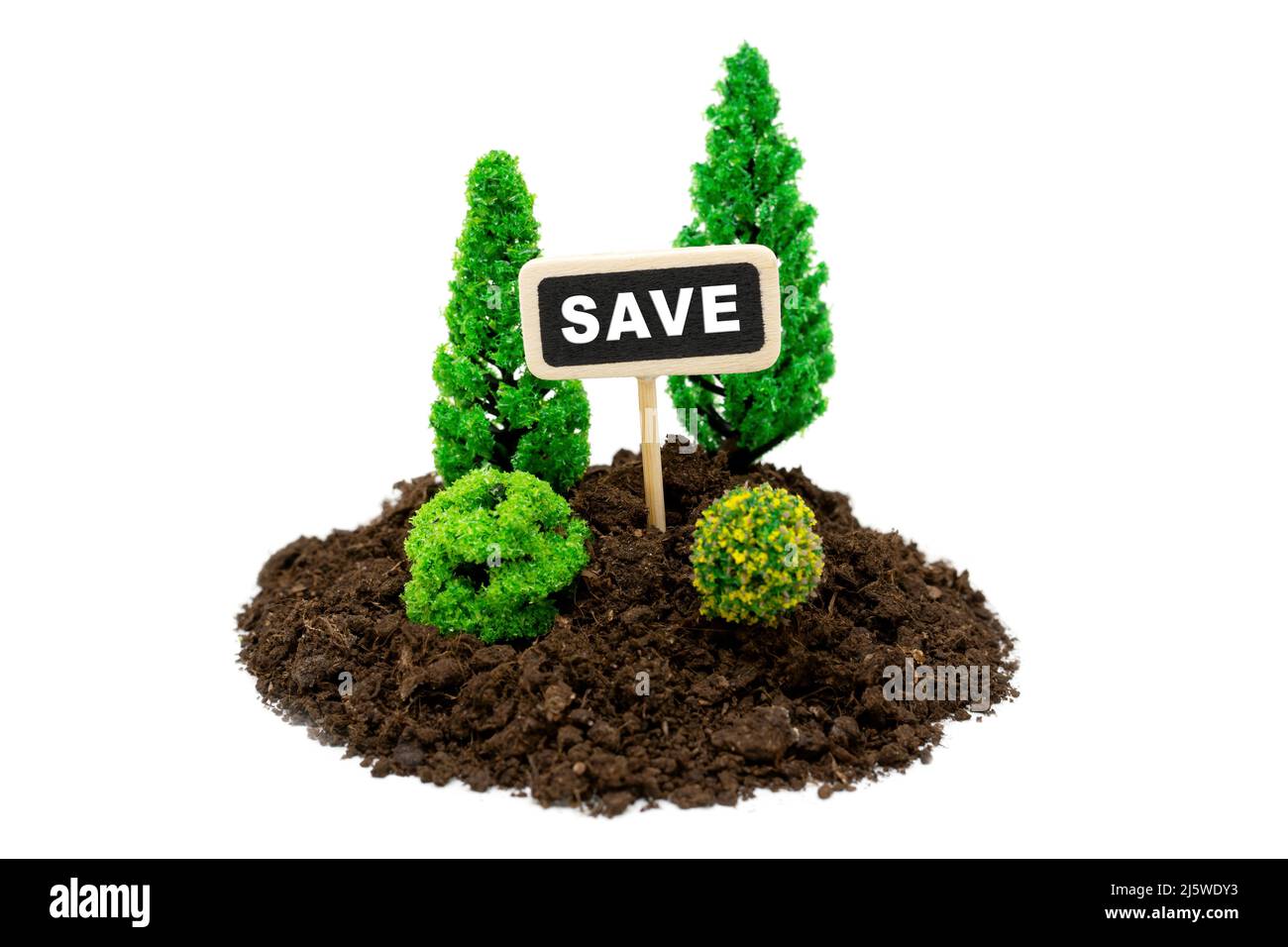 Miniature toy forest setup with a SAVE sign isolated on white ...