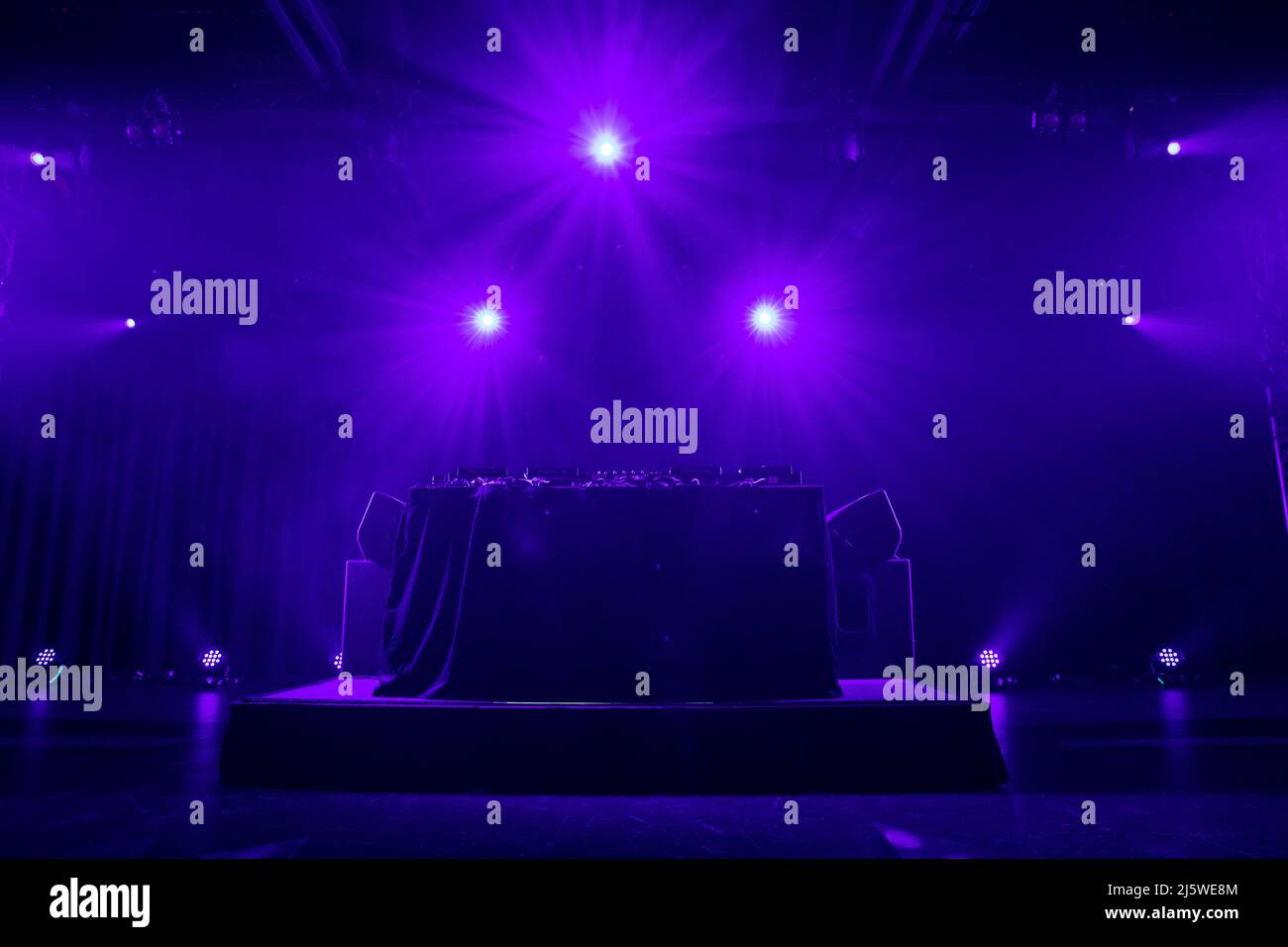 Dj Booth set up on stage with aesome lighting Stock Photo - Alamy