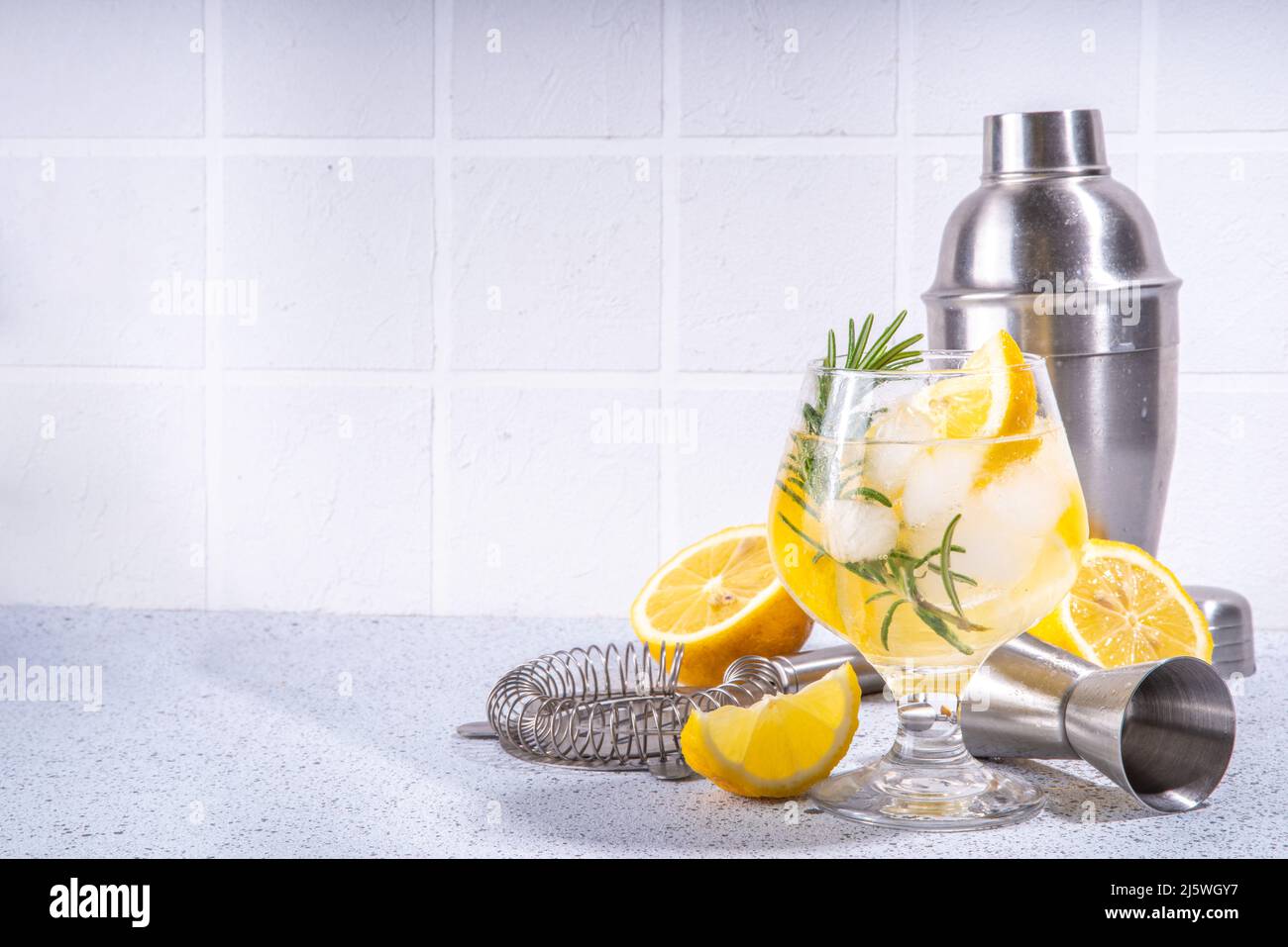 Infused rosemary lemon drink. Cold detox citrus lemonade with ...