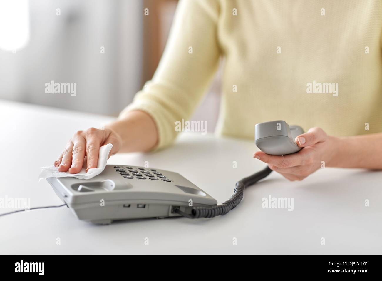Woman hand clean phone hi-res stock photography and images - Alamy