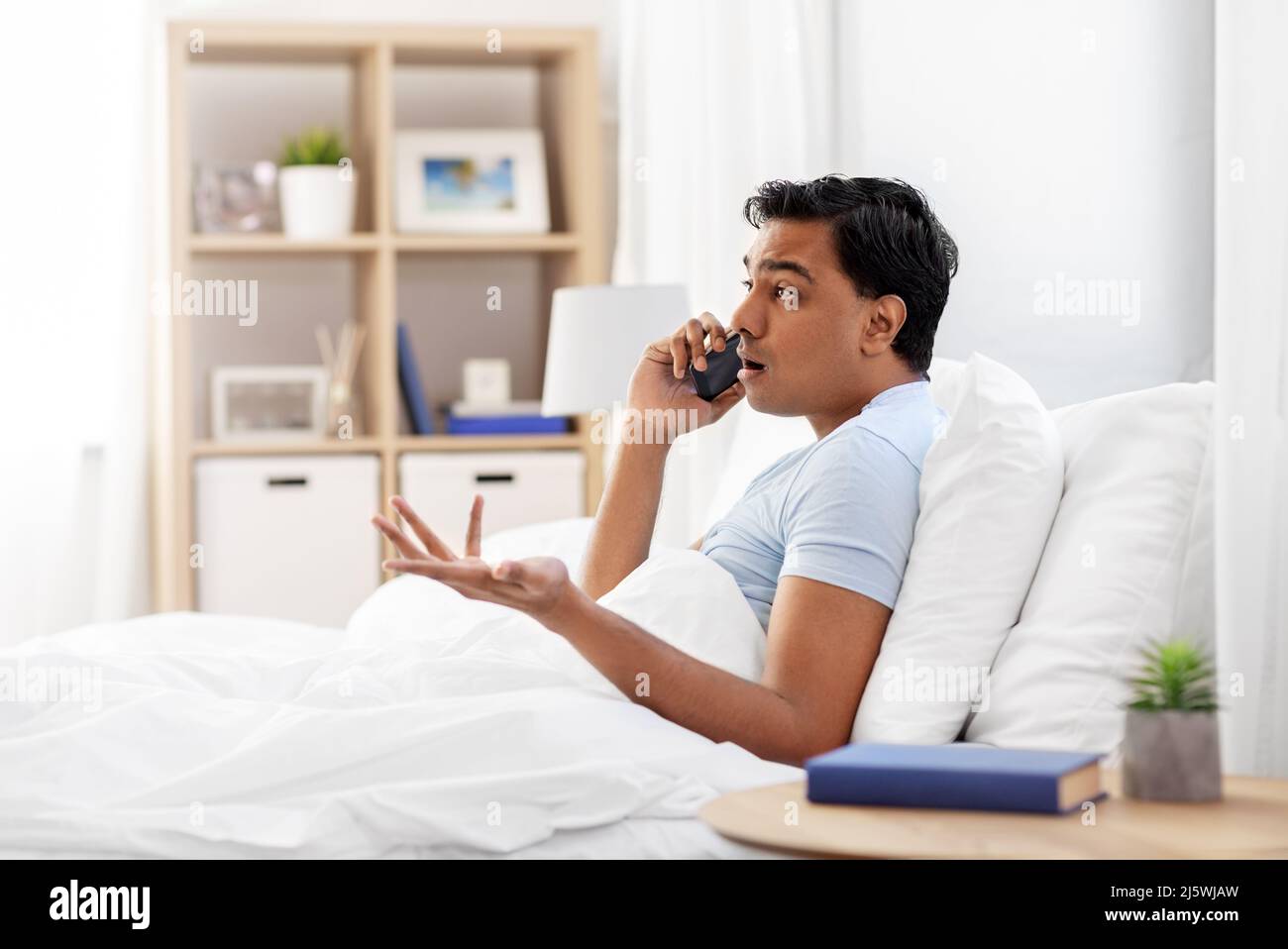 South indian man talking cell hi-res stock photography and images - Alamy