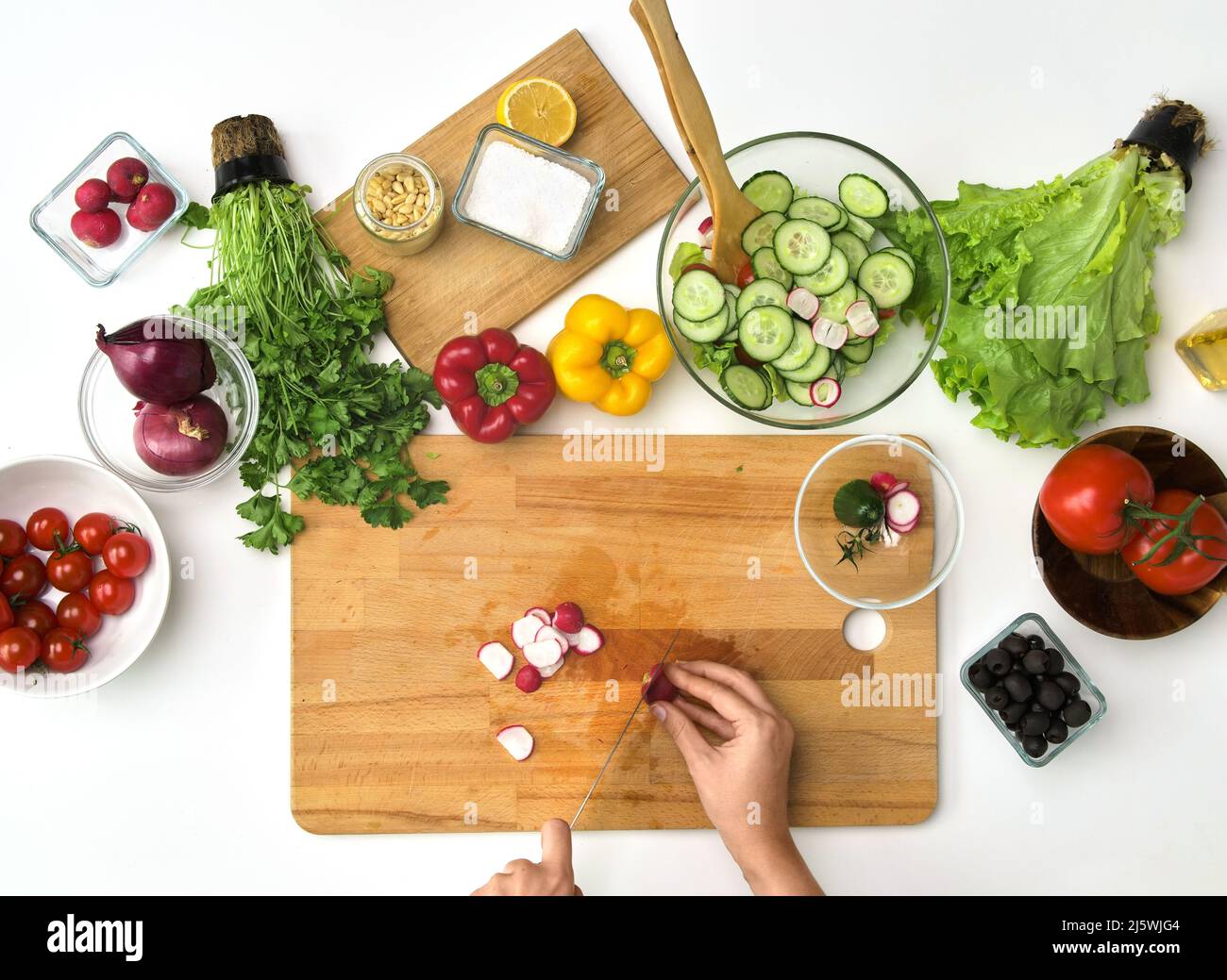 Female hands chopping yellow hi-res stock photography and images - Alamy