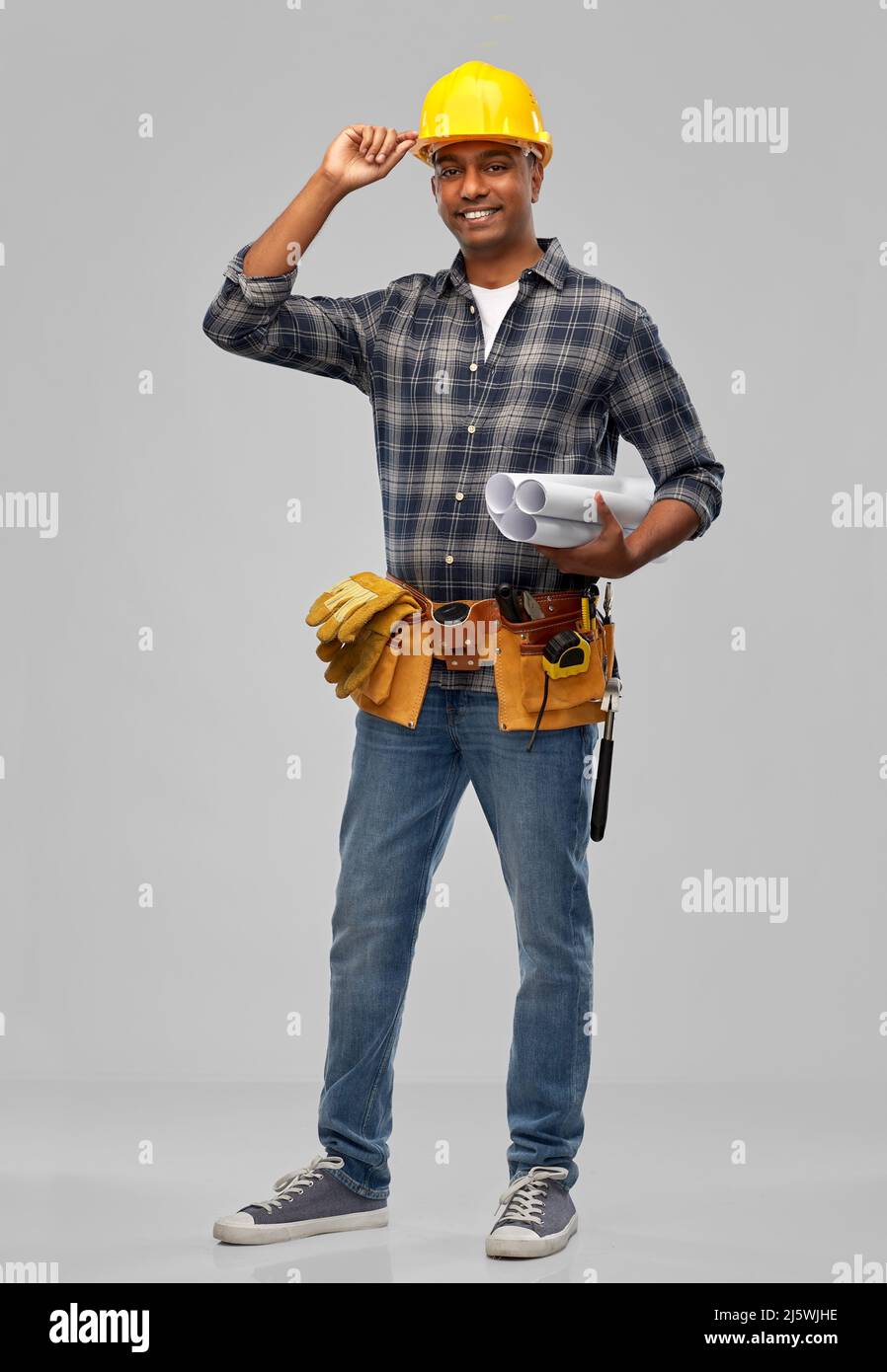 happy indian builder in helmet with blueprint Stock Photo - Alamy