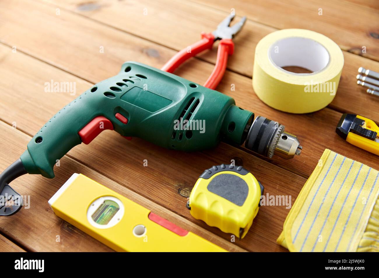 different work tools on wooden boards Stock Photo - Alamy