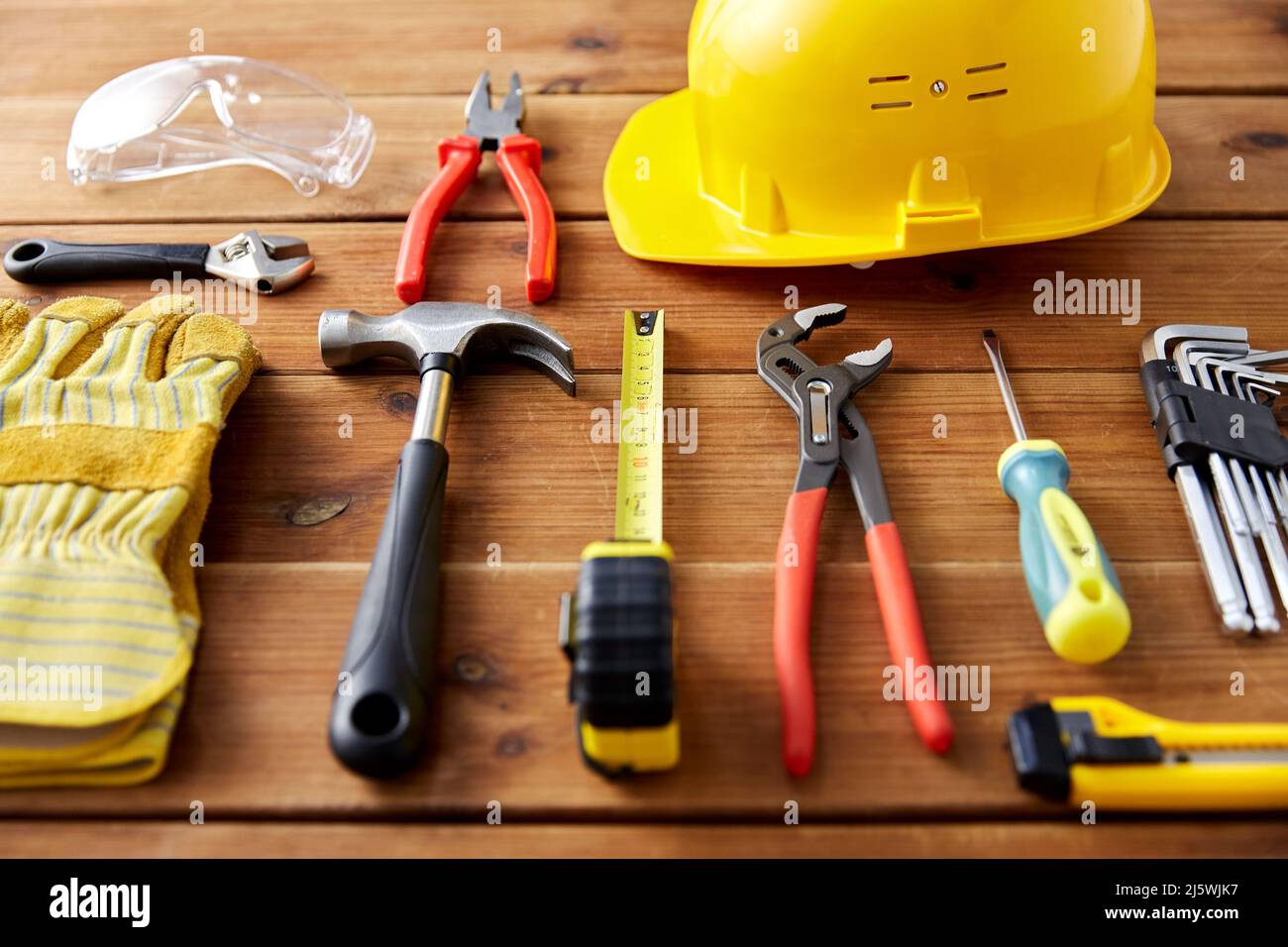 different work tools on wooden boards Stock Photo - Alamy