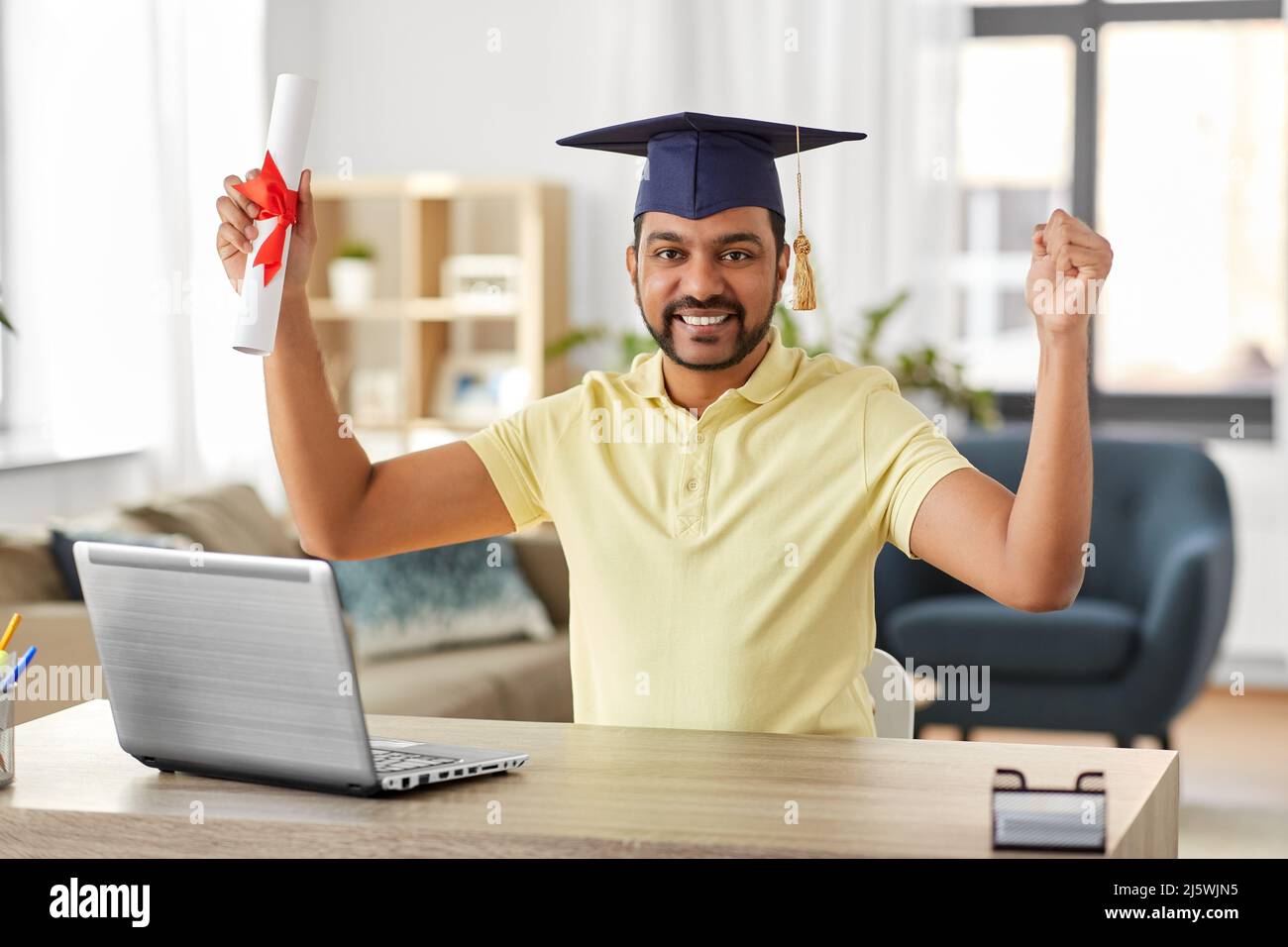 Indian student with laptop hi-res stock photography and images - Alamy