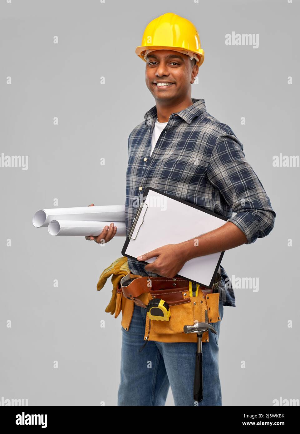 happy indian builder with blueprint and clipboard Stock Photo - Alamy