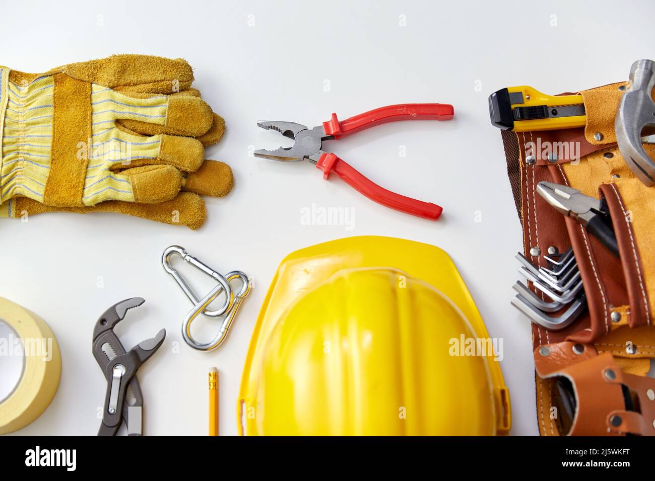 different work tools on white background Stock Photo - Alamy