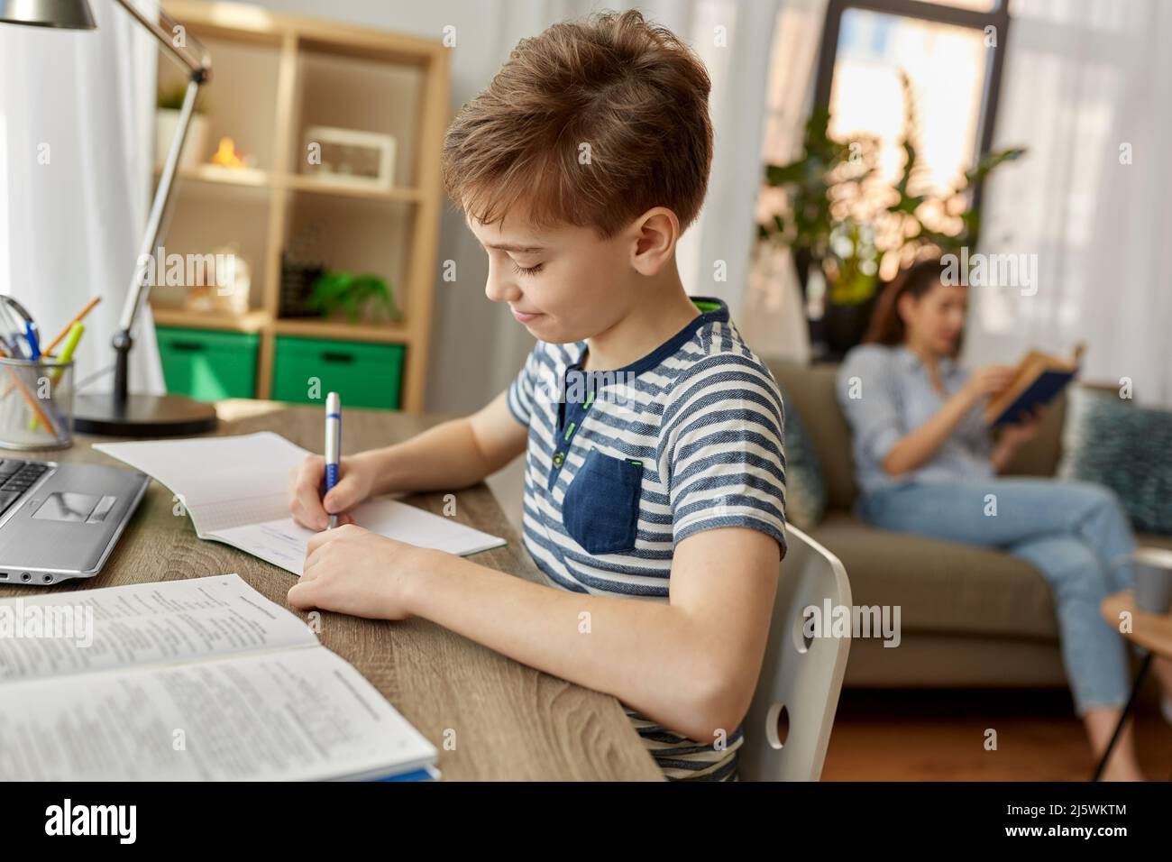 Male student book pen hi-res stock photography and images - Alamy