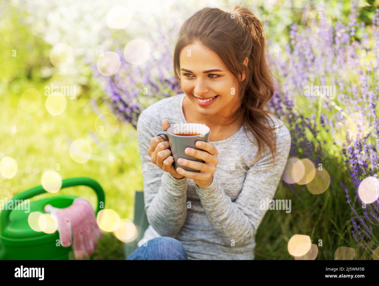 Gardener drinking mug hot tea hi-res stock photography and images - Alamy