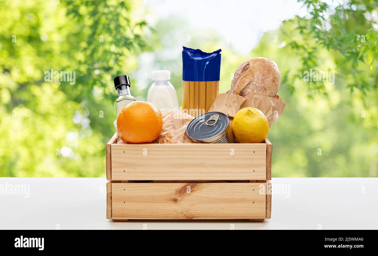 food in wooden box on table Stock Photo - Alamy