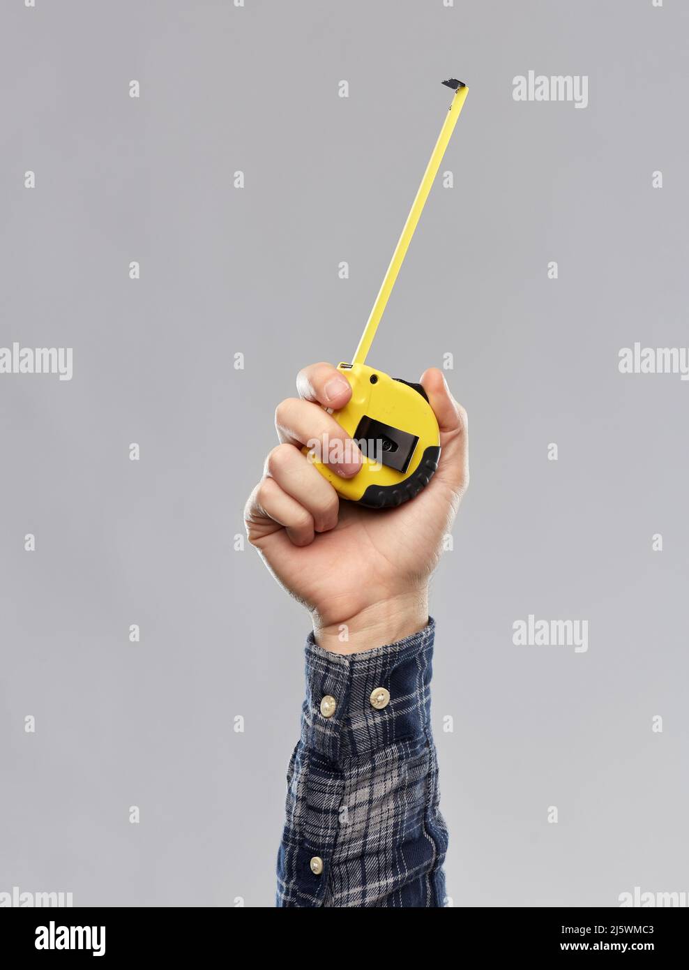 Hand holding measuring ruler hi-res stock photography and images - Alamy