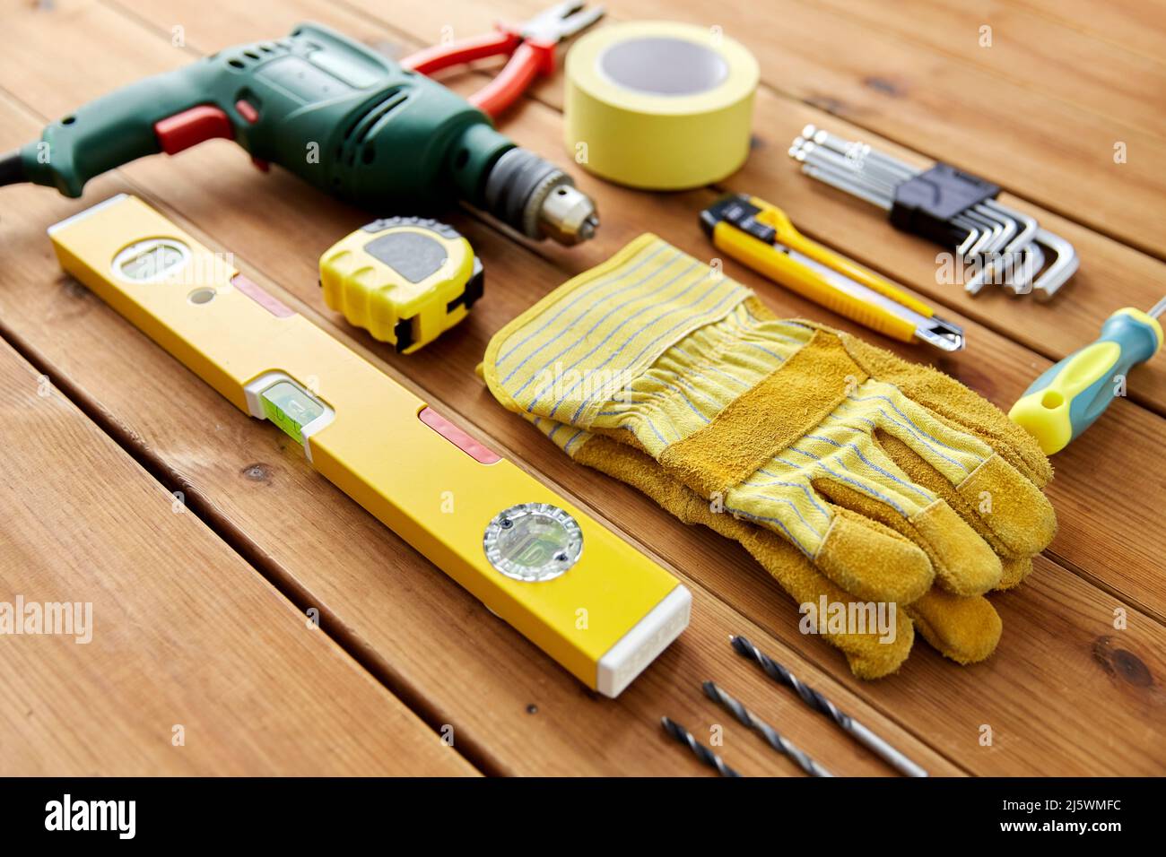 different work tools on wooden boards Stock Photo - Alamy