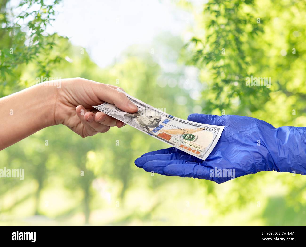 Hand taking money hi-res stock photography and images - Alamy