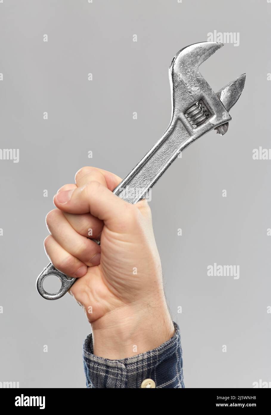 Hand holding wrench hi-res stock photography and images - Alamy