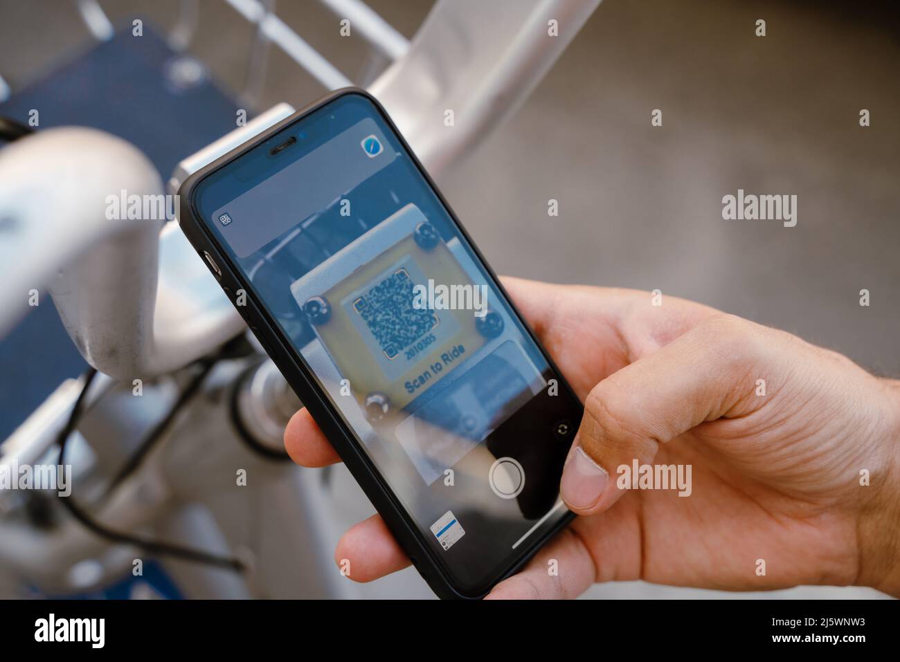 Scanning qr code outdoors hi-res stock photography and images - Alamy