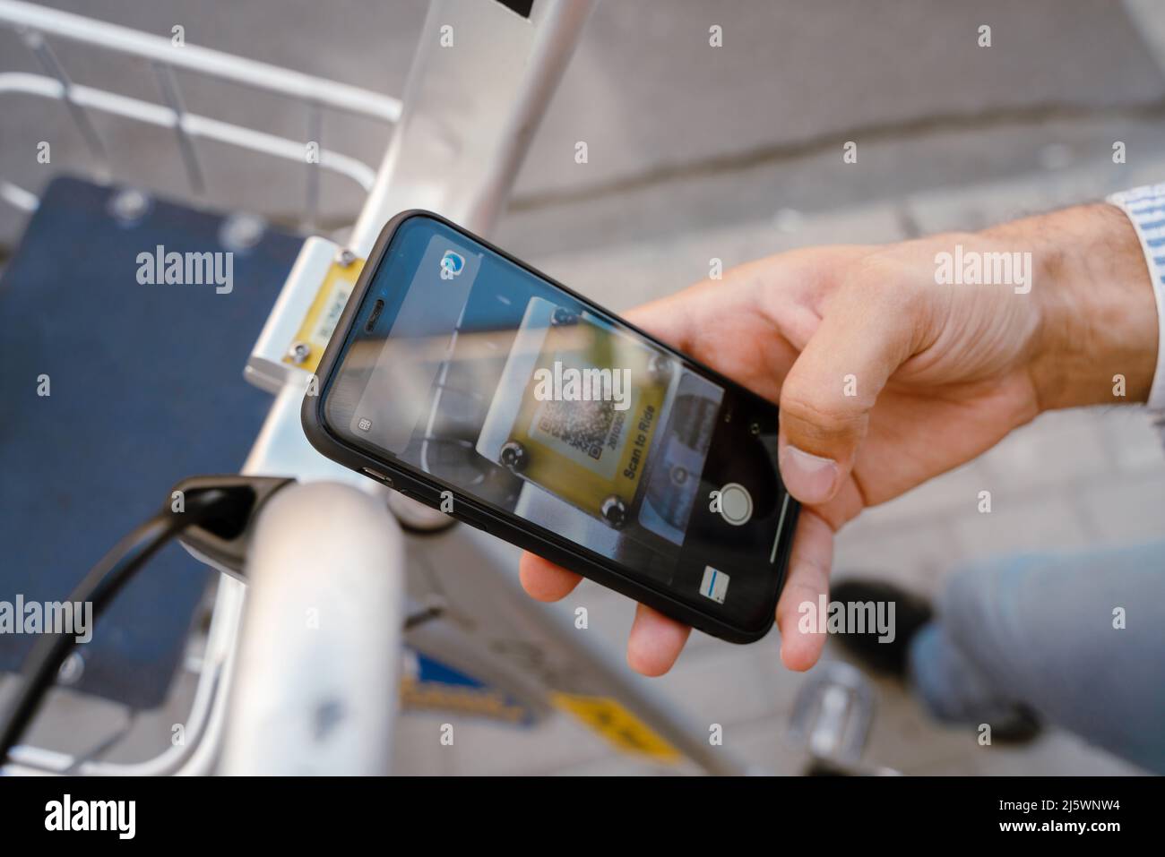 Scanning qr code outdoors hi-res stock photography and images - Alamy