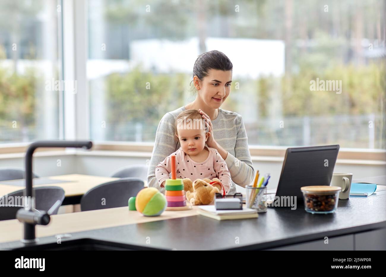 Home office woman child hi-res stock photography and images - Alamy
