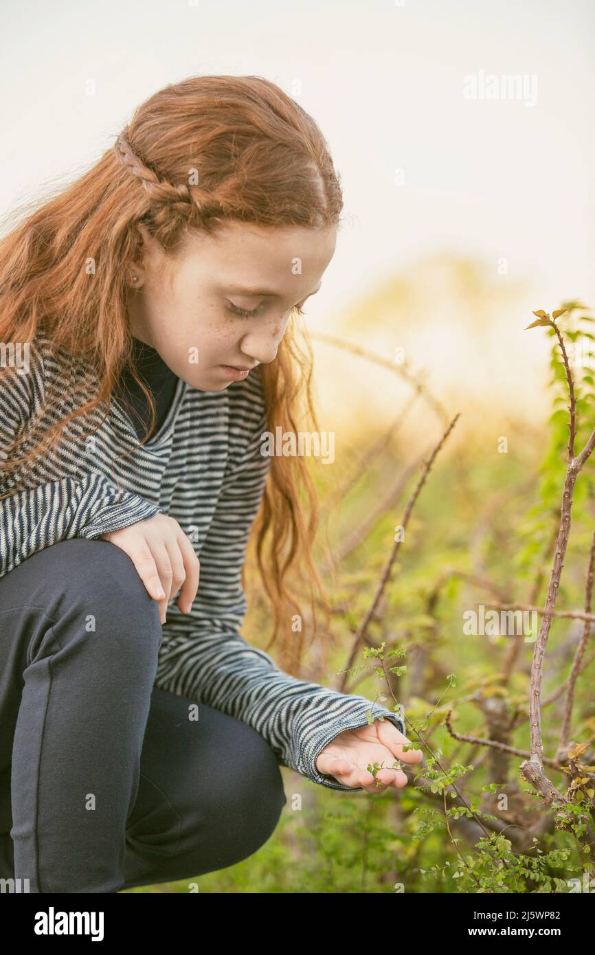 Beautiful redhead girl outdoors Stock Photo - Alamy
