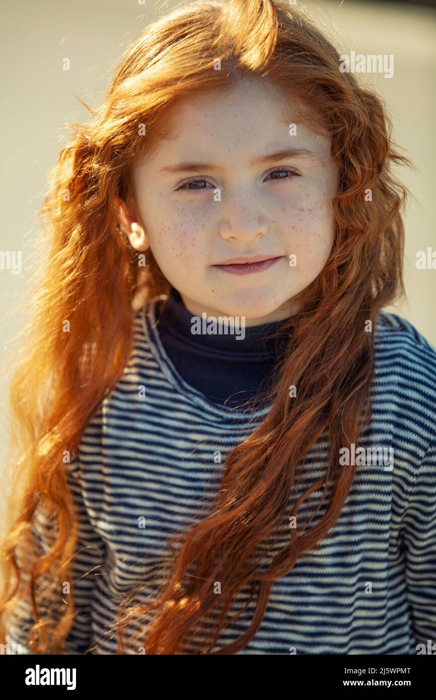 Beautiful redhead girl outdoors Stock Photo - Alamy