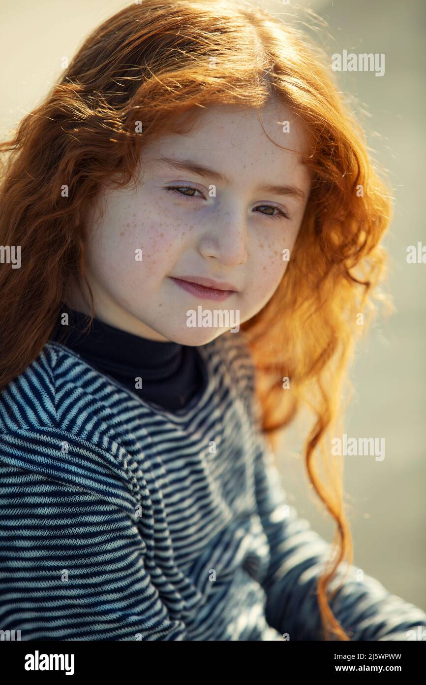 Beautiful redhead girl outdoors Stock Photo - Alamy